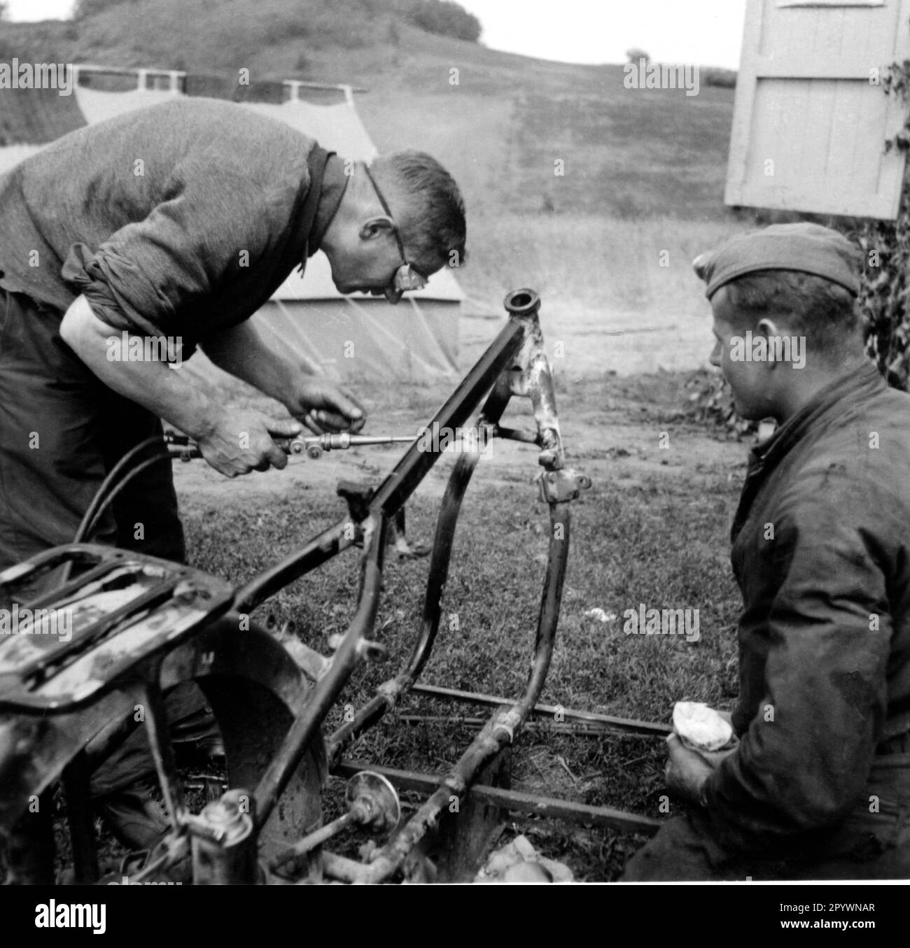 1941 German soldiers welding a motorcycle frame. [automated translation ...