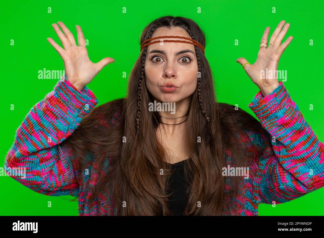 Excited amazed woman touching head, showing explosion, looking worried ...