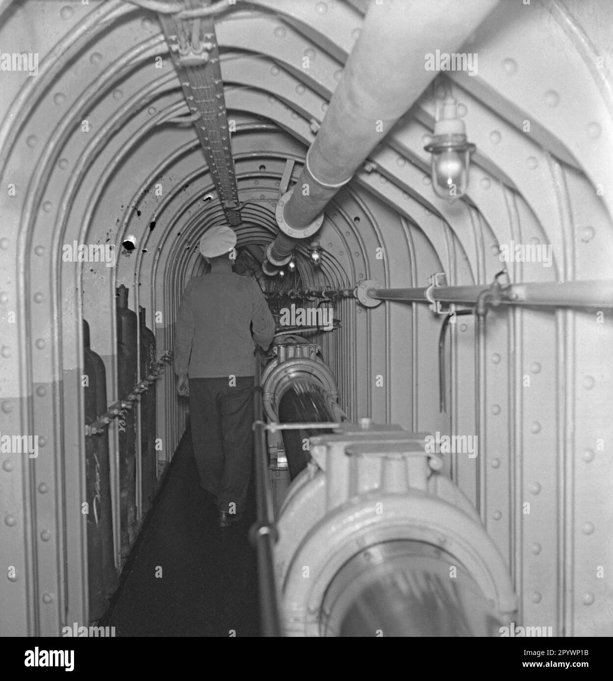 "A mechanic next to a drive shaft of the passenger ship ""Monte Rosa ...