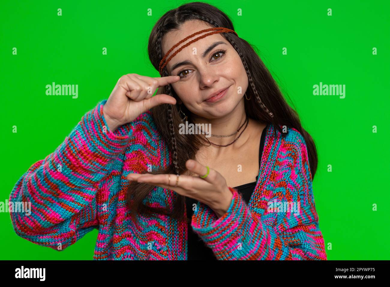 Need some more, please give me. Woman showing a little bit gesture with ...