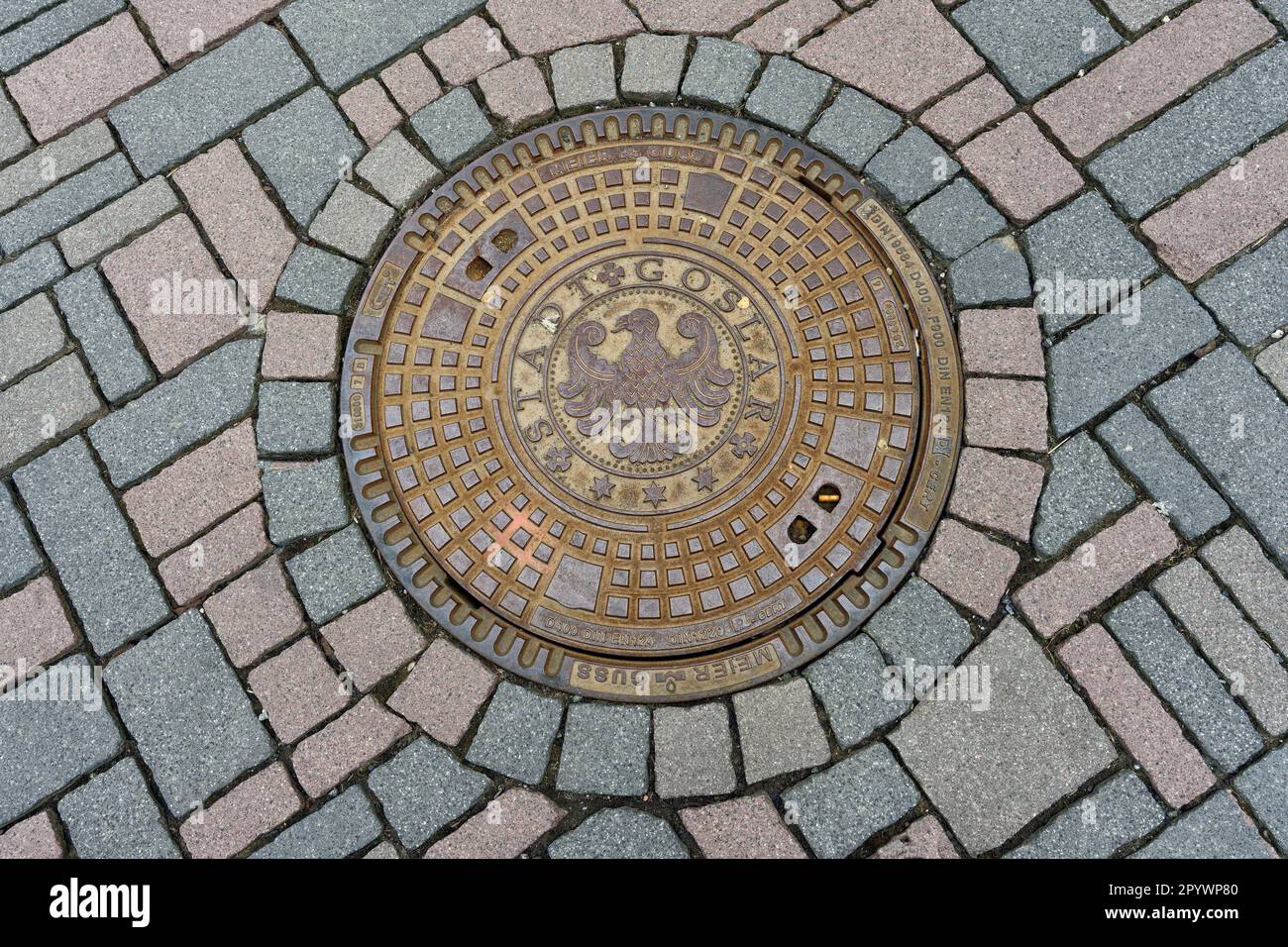 Manhole cover plate with city coat of arms, Goslar, Harz, Lower-Saxony ...