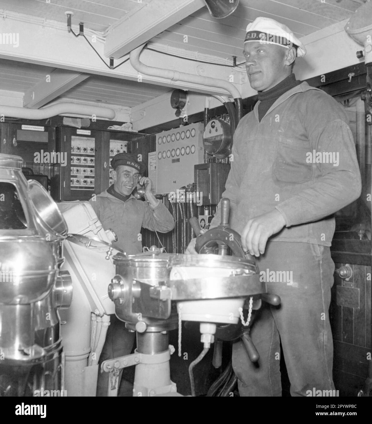 "A helmsman on the bridge of the ""Monte Rosa"" of Hamburg Sued in the ...