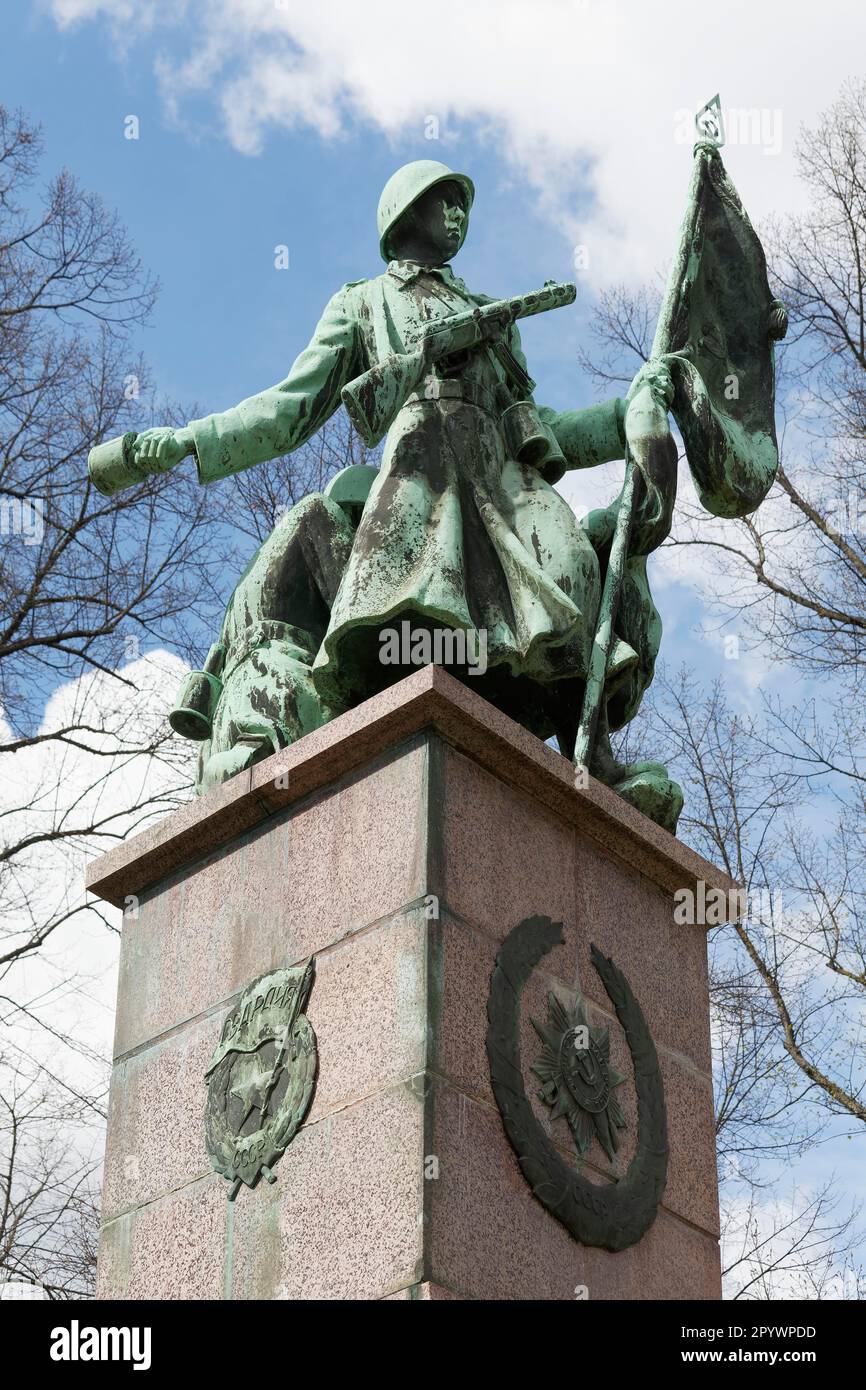 Soviet soldier with weapon and flag, Monument to the soldiers of the ...