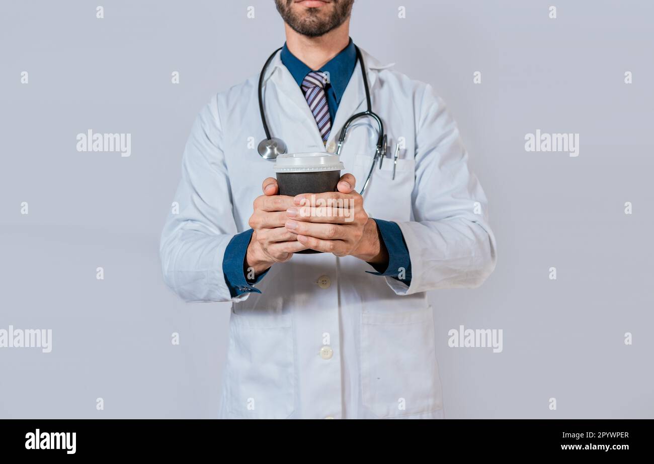 Doctor hands holding paper coffee. Doctor holding takeaway coffee on ...