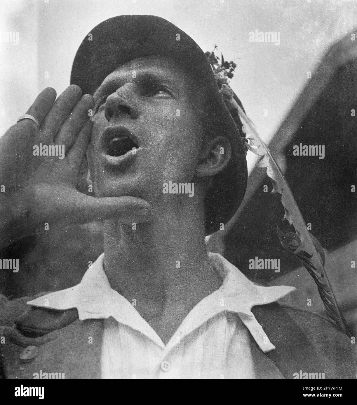 A man shouting in the Berchtesgadener Land. Undated photo from around ...