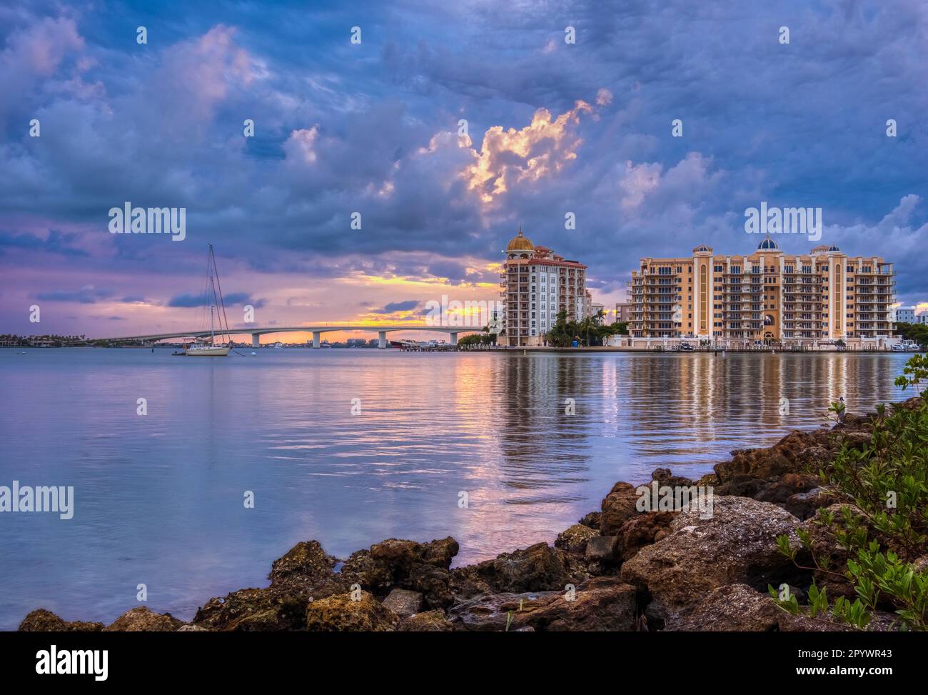 Cloudy sunset over Goldern Gate Point and the John Ringling Causeway ...