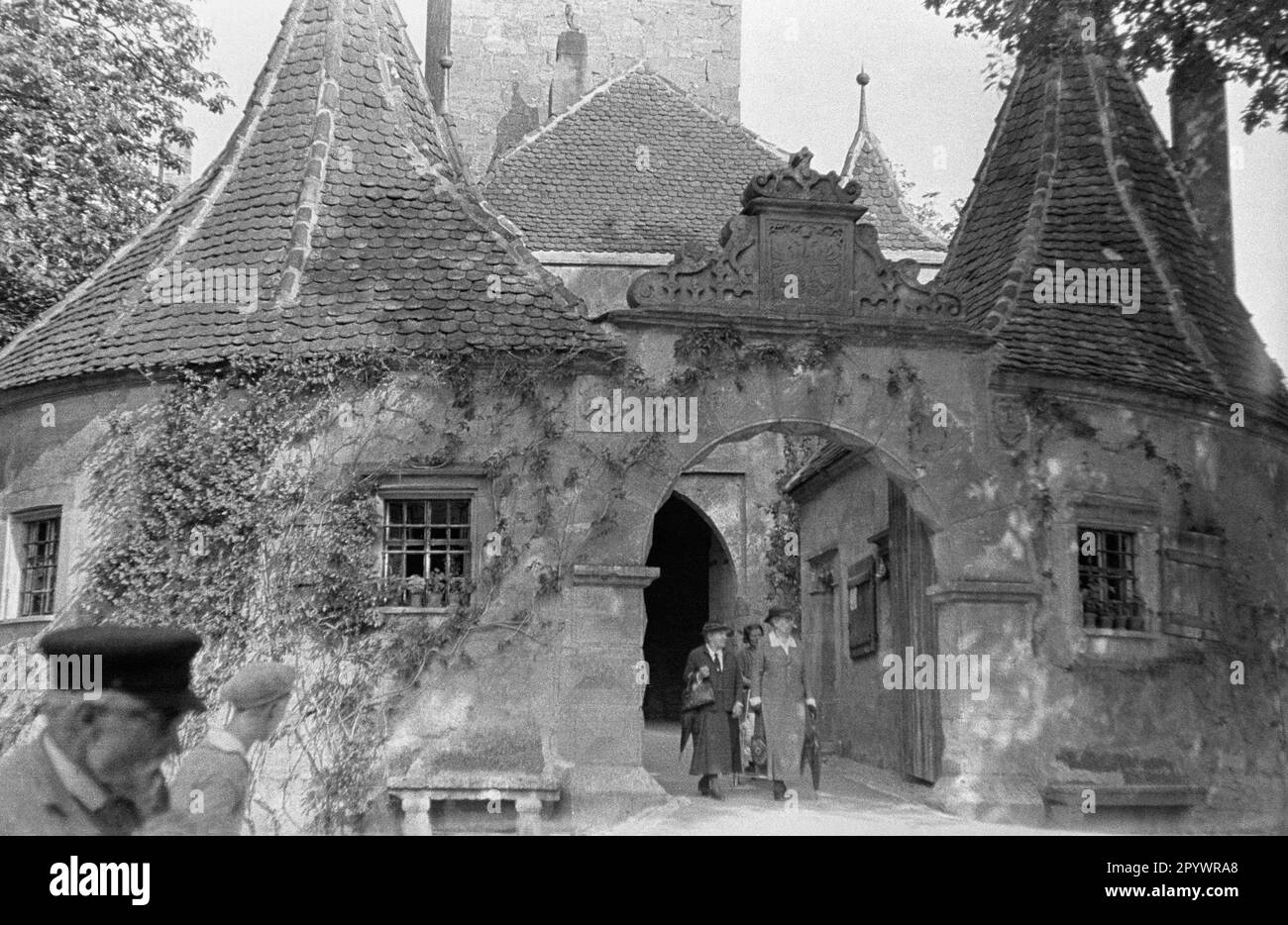 The castle gate in the medieval old town of Rothenburg ob der Tauber ...