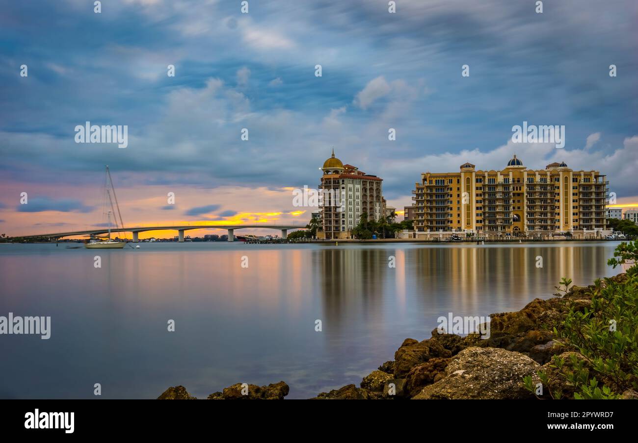 Cloudy sunset over Goldern Gate Point and the John Ringling Causeway ...