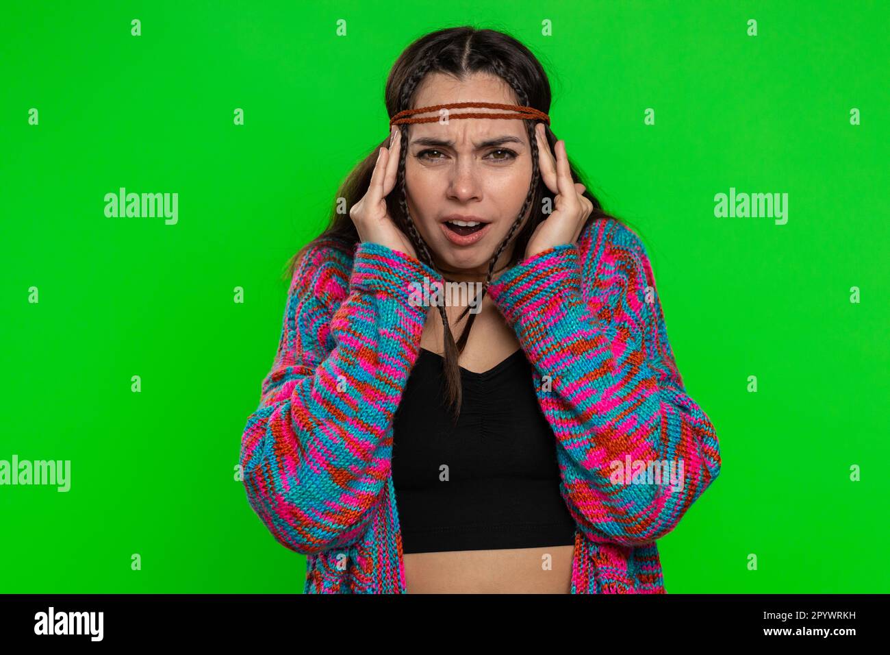 Pretty hippie woman rubbing temples to cure headache problem, suffering ...