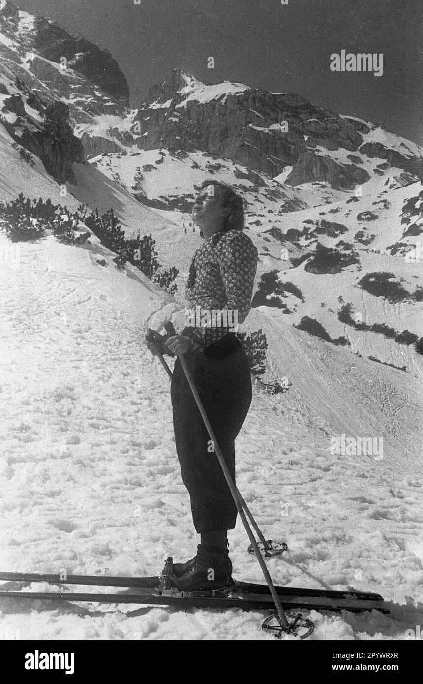 A skier posing for the camera on a ski slope in the Austrian Alps ...