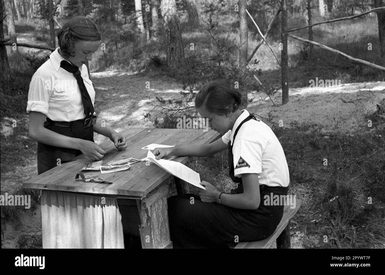 Two girls reading letters in the summer camp of the Bund Deutscher ...