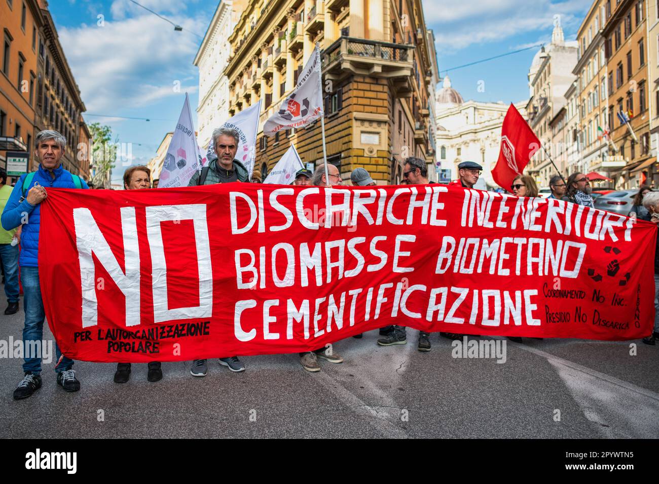 Protesters hold a banner that reads 'no to landfills incinerators ...