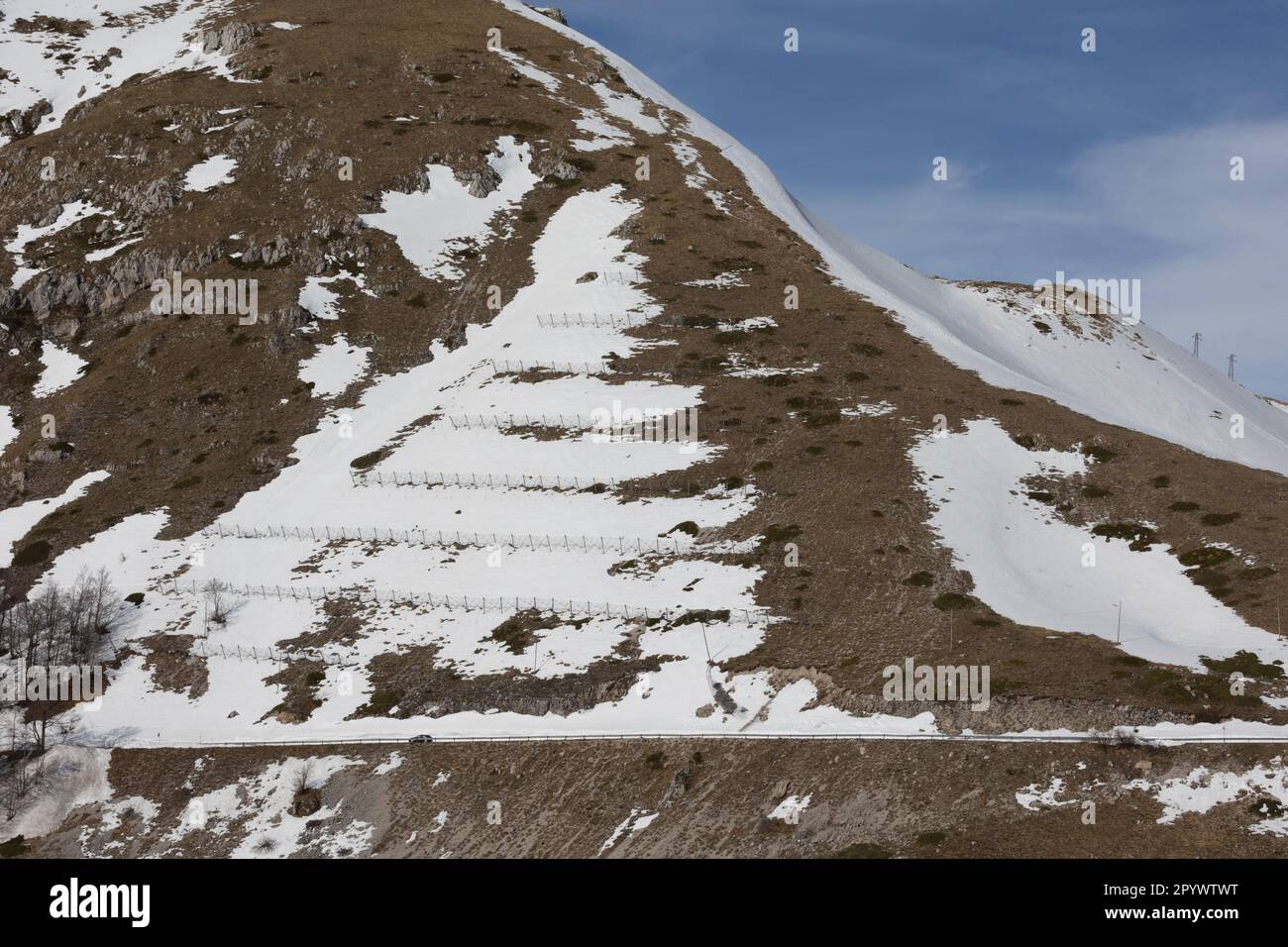 Snow-capped peaks under the clear blue sky at Monte Terminillo Stock ...