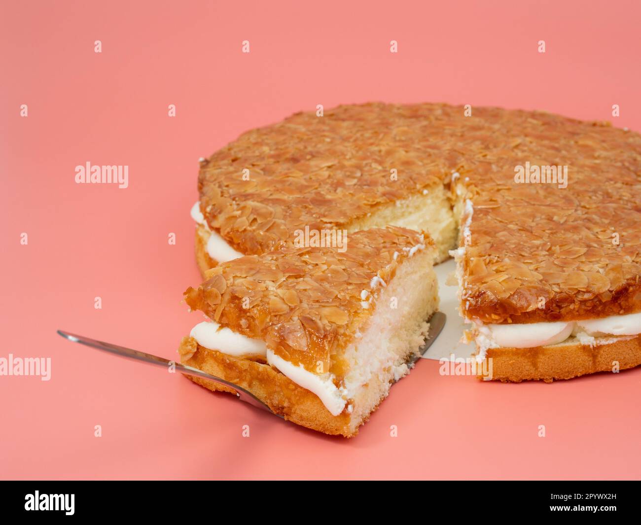 Bee sting cake, light cake with cream filling, with crispy almonds ...