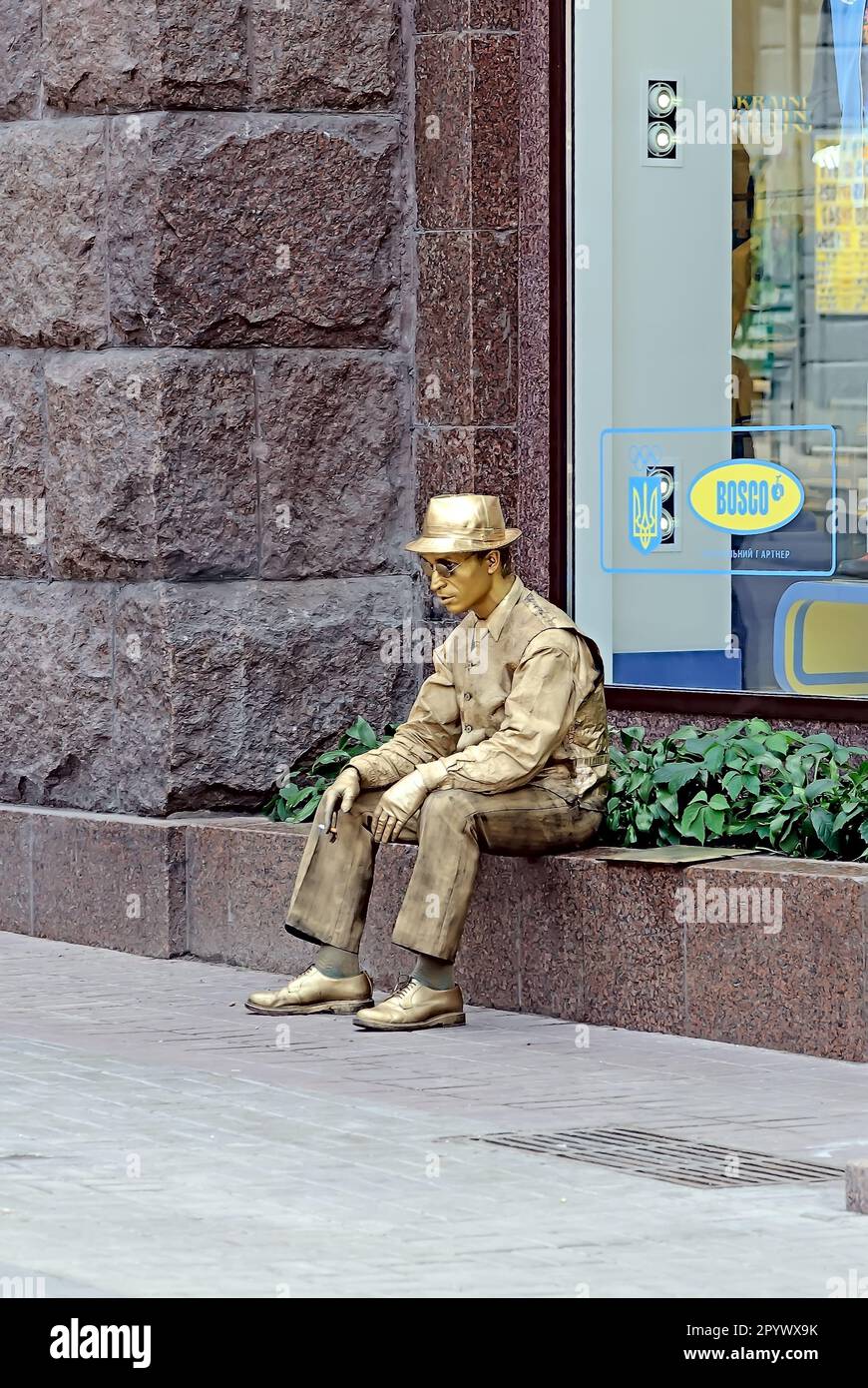 An unidentified busking mime smoking performs on Khreshchatyk street in ...