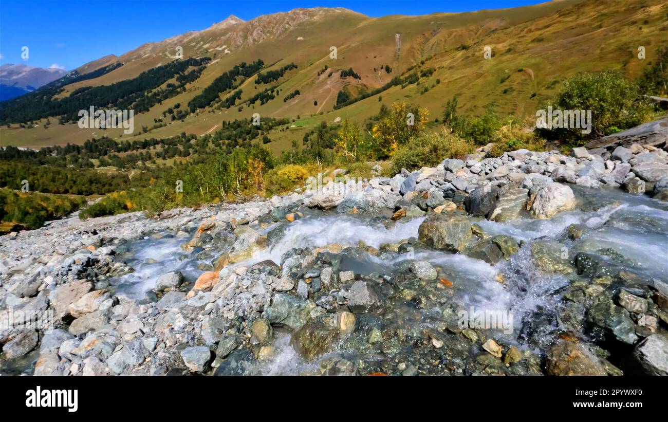 cute fast mountain ridge river with clear water at summer day - photo ...