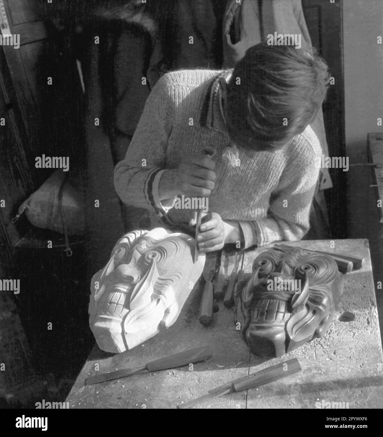 Man sits in workshop works hi-res stock photography and images - Alamy