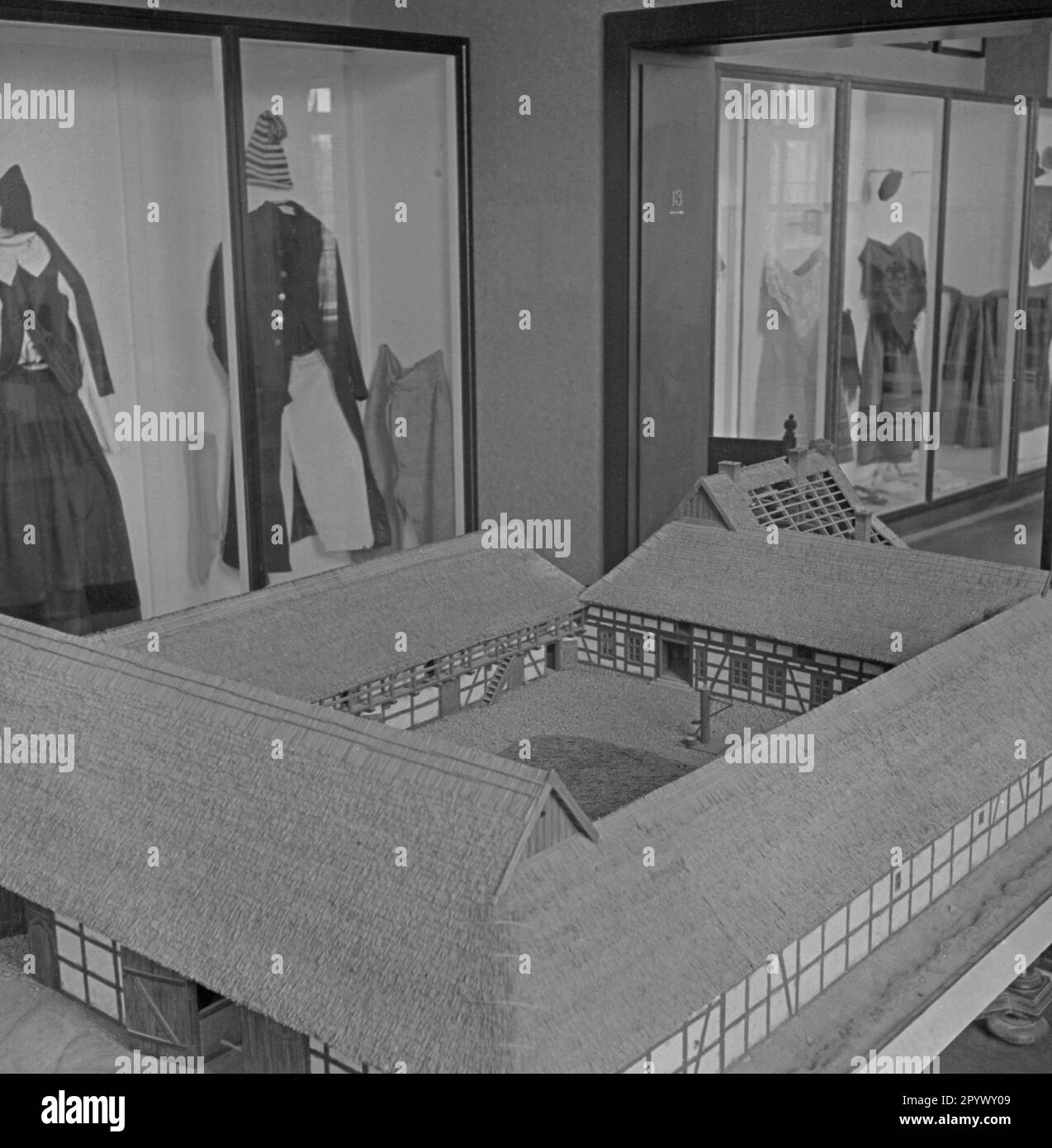 Model of a property is displayed in a room. It is probably a museum ...