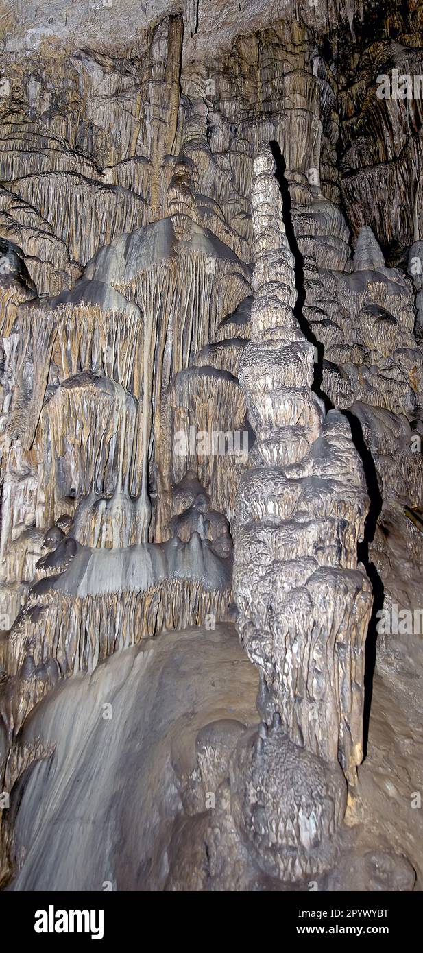 Stalagmite and underground lake in the Psychro Cave, Crete, Greece ...