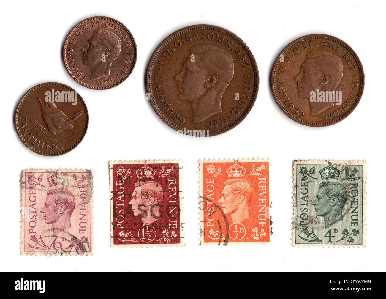 Vintage coins and stamps from the reign of King George VI isolated on a ...