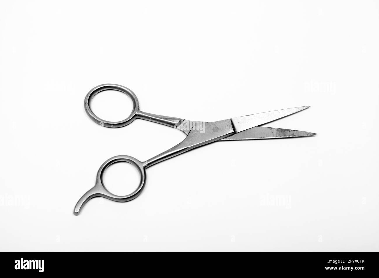 Metal scissors isolated on a white background Stock Photo - Alamy