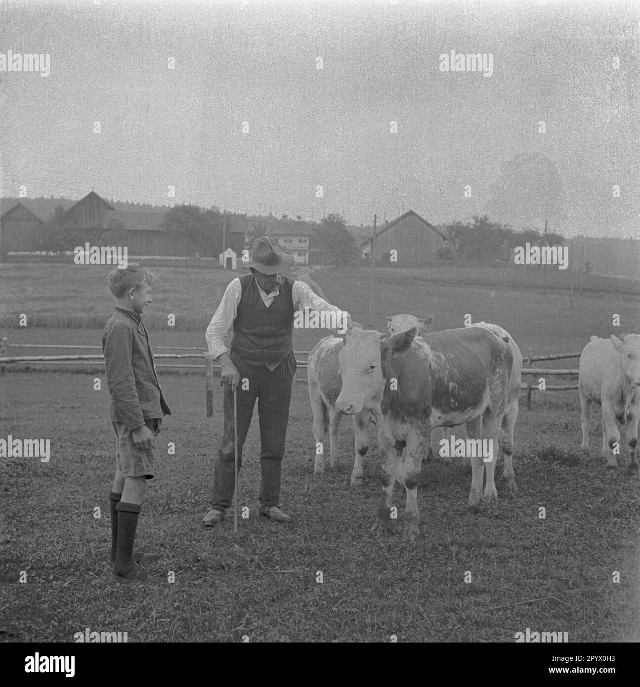 "Family on a farm in Upper Bavaria while eating. From the series ...