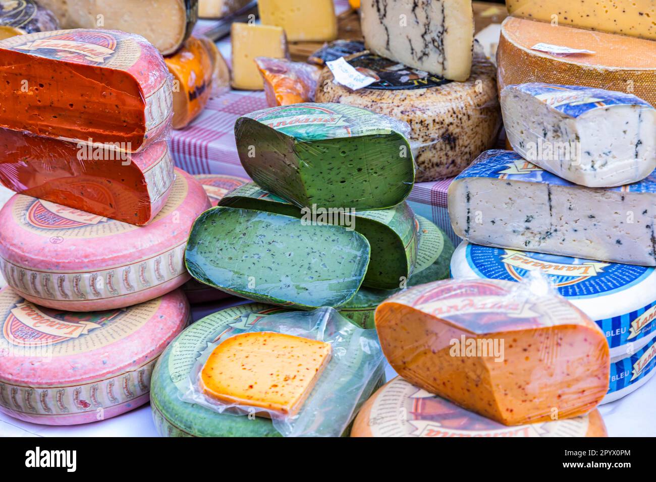 Coloured cheese offered at the Naschmarkt in Vienna, Vienna, Austria ...