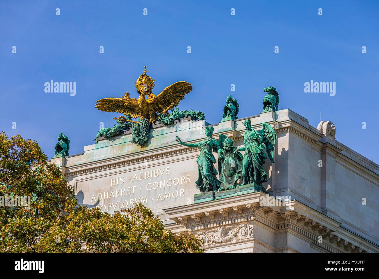 Golden crown and golden eagle, bronze statues on the roof of the new ...