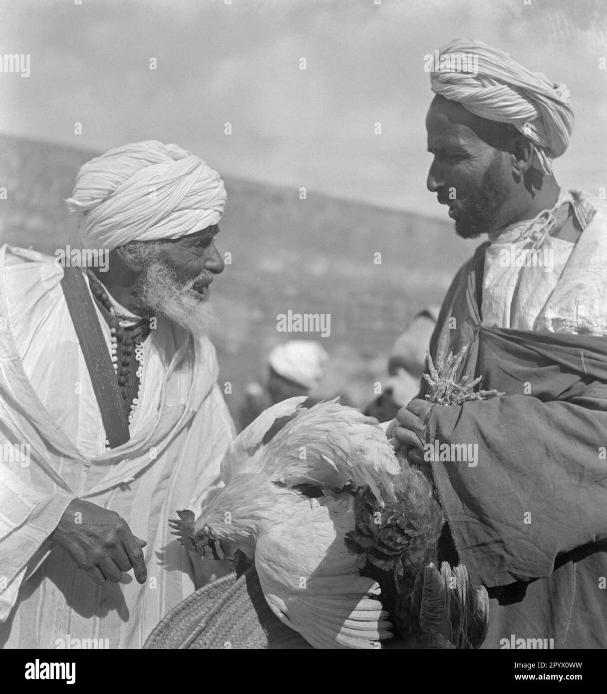 Two men facing Black and White Stock Photos & Images - Alamy