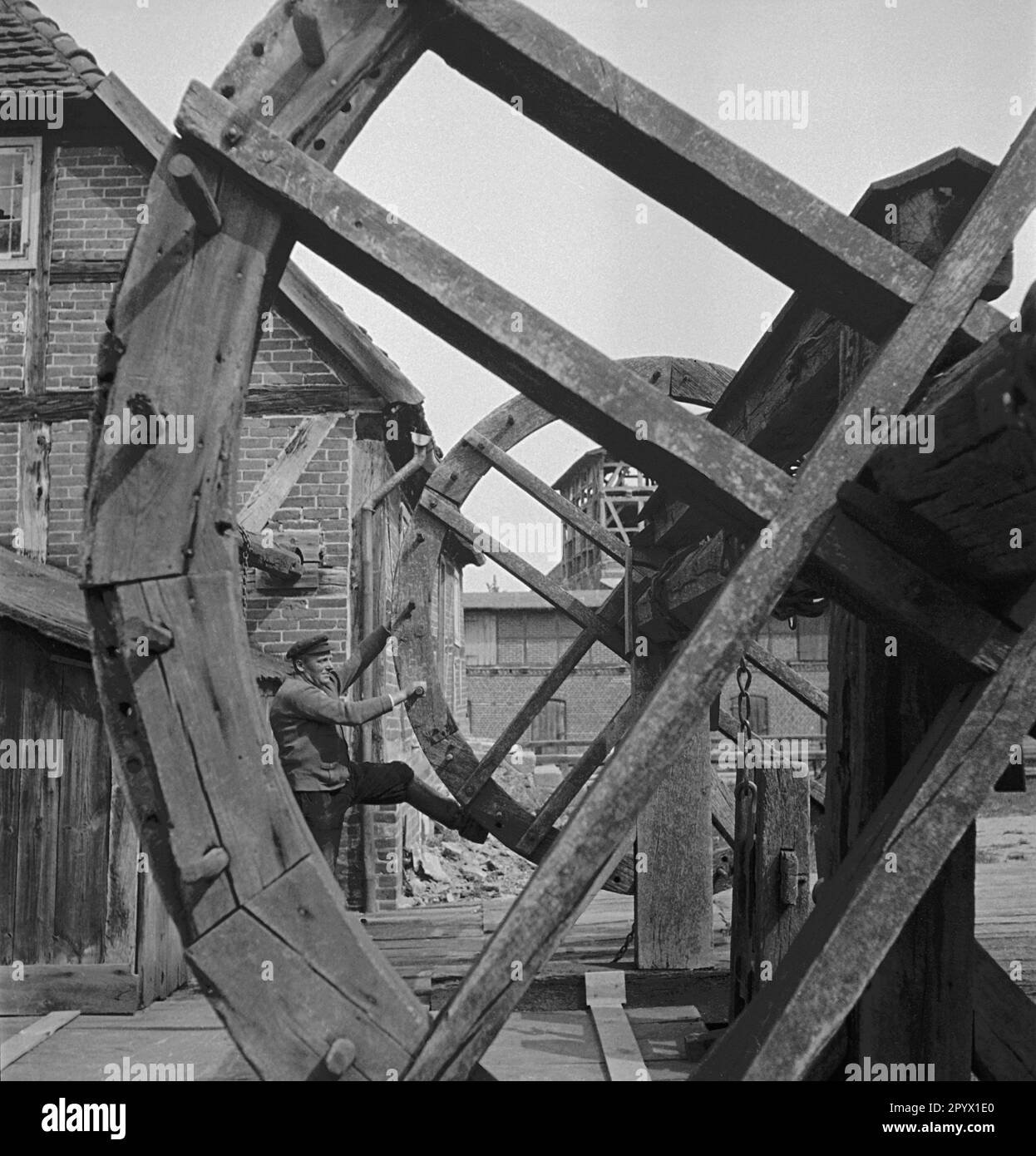Man operates an eel trap. The wheel is used to catch the eels Stock ...