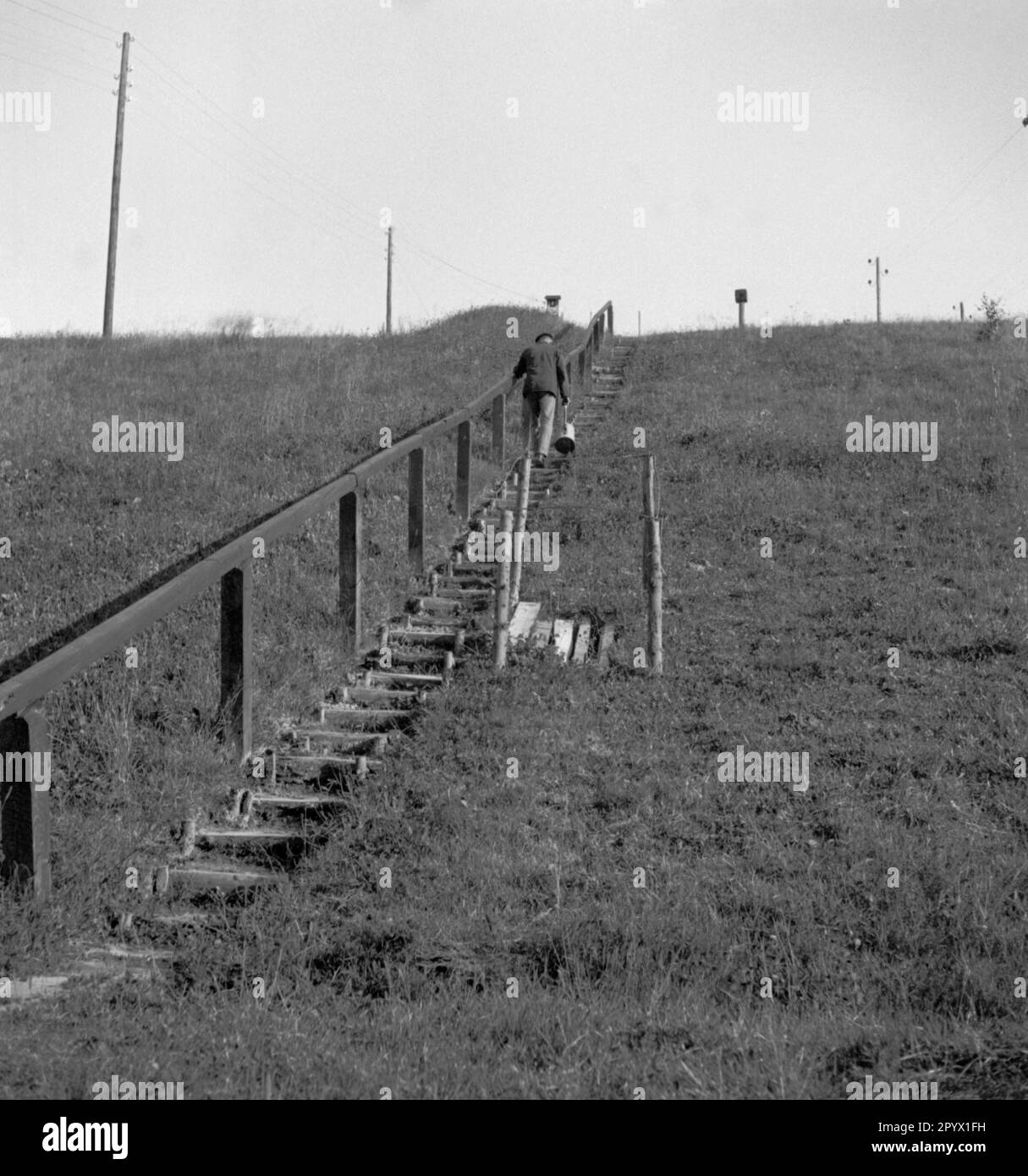 Man goes up steps hi-res stock photography and images - Alamy