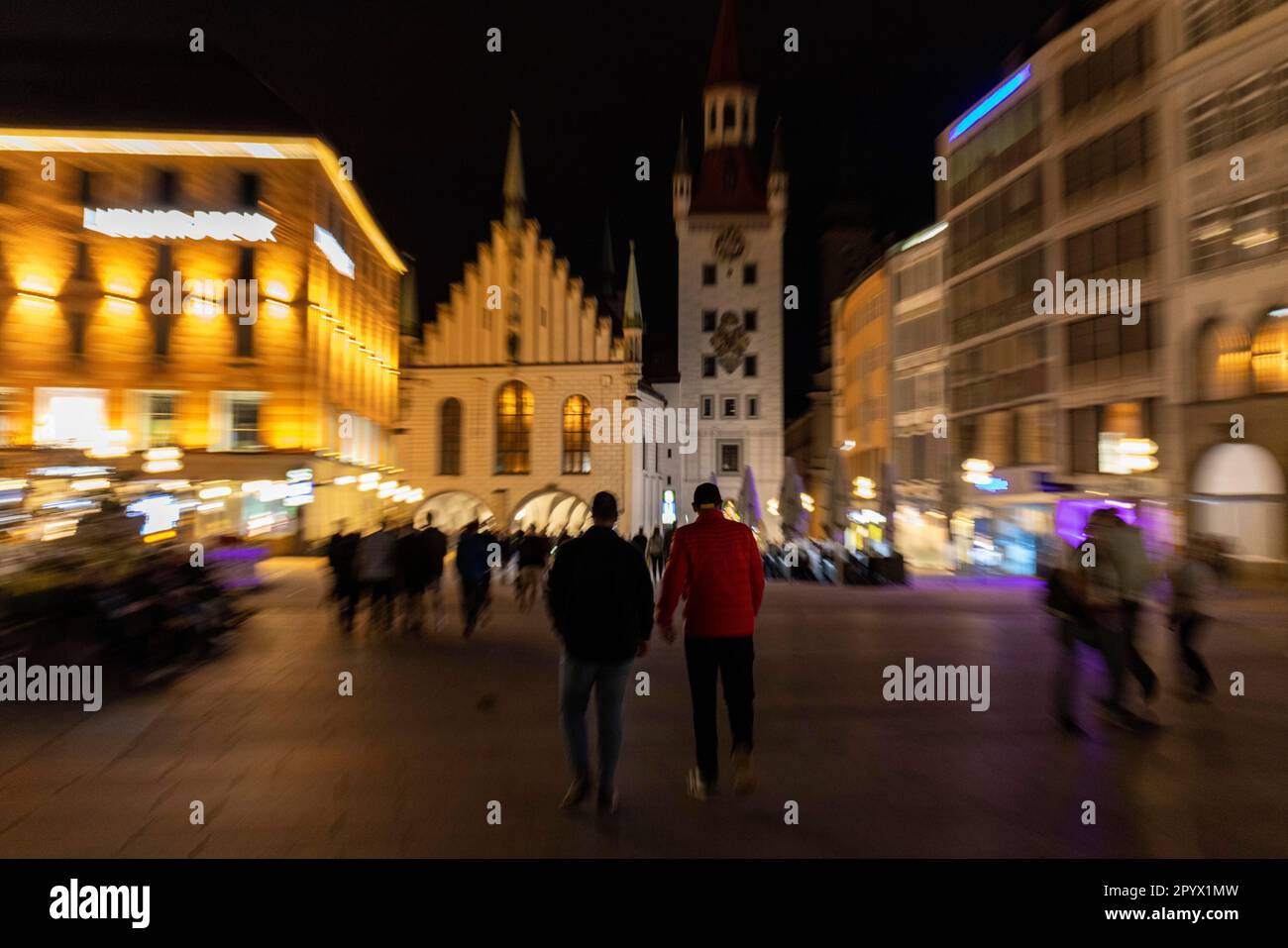 Passers-by at night at Marienplatz, dynamic image, Munich, Bavaria ...