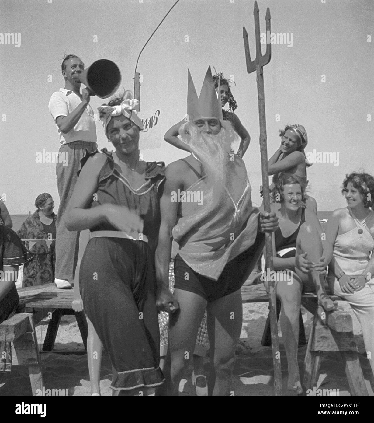 Neptune And A Bathing Beauty At A Beauty Contest For The Most Beautiful Bathing Belle Left In