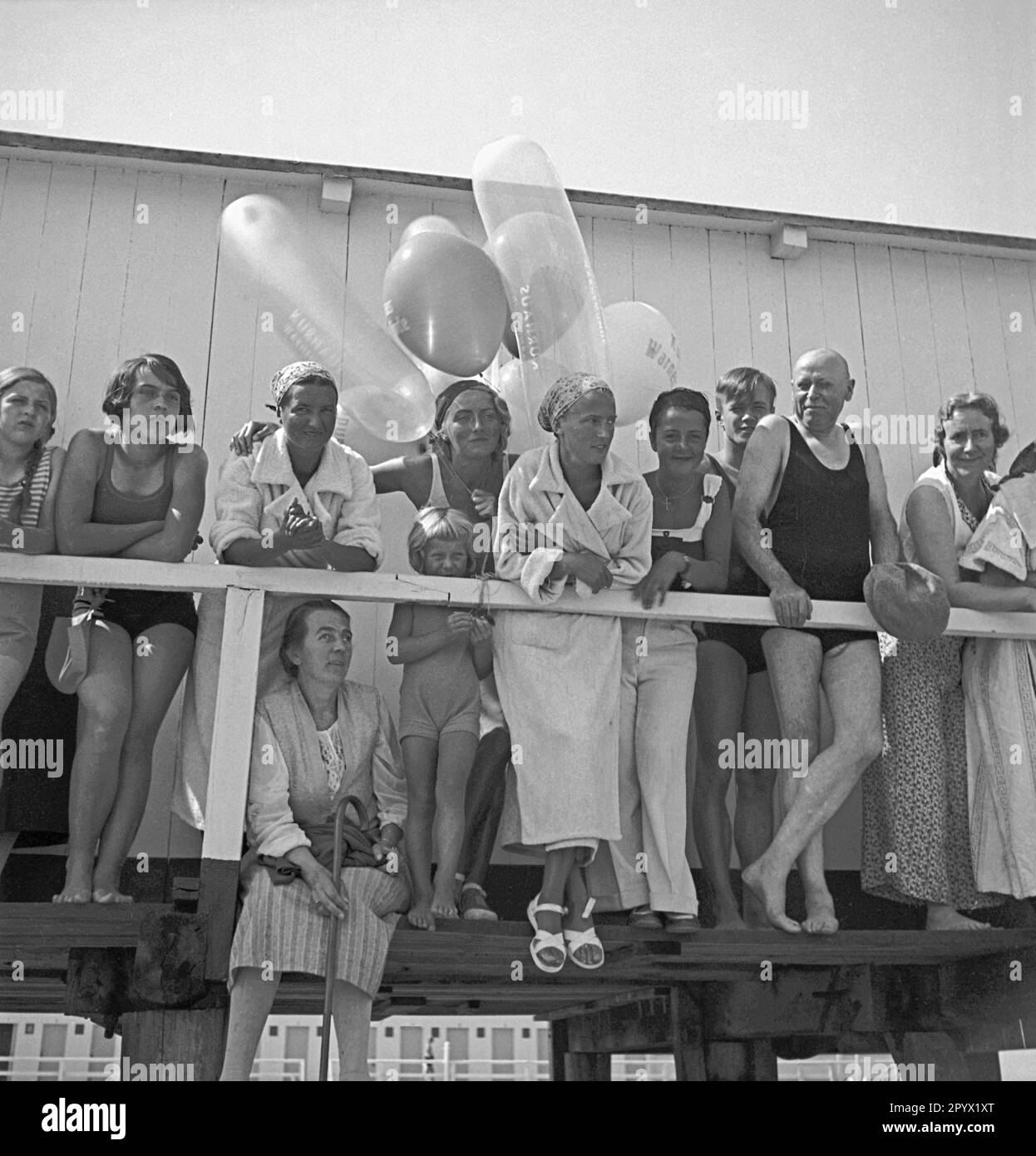 Spectators at a competition on the beach party in Warnemuende Stock ...