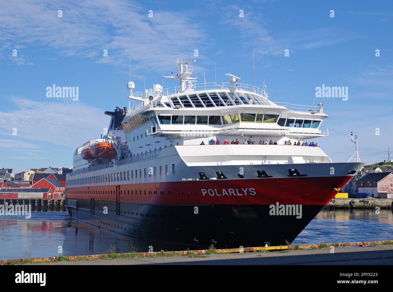 A Hurtigruten ship turns in the harbour of the town of Vardoe, tourism ...