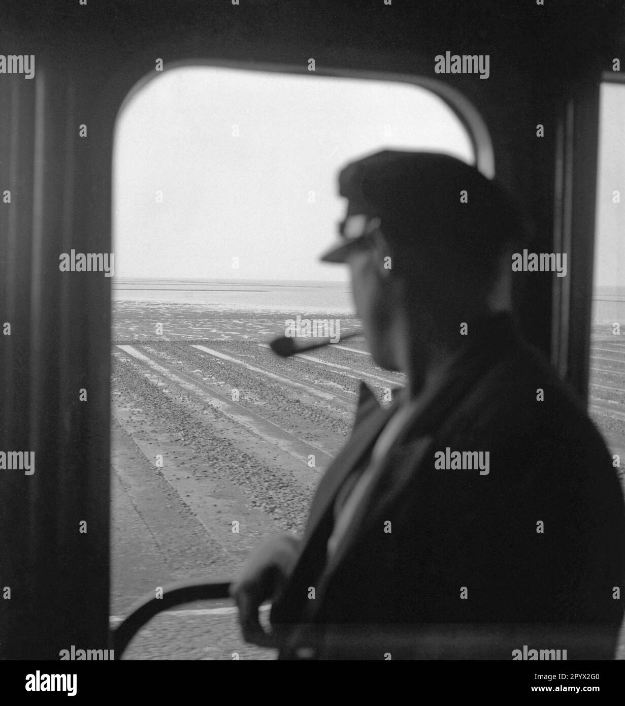 Adolf hitler looks out the window of a train Black and White Stock ...