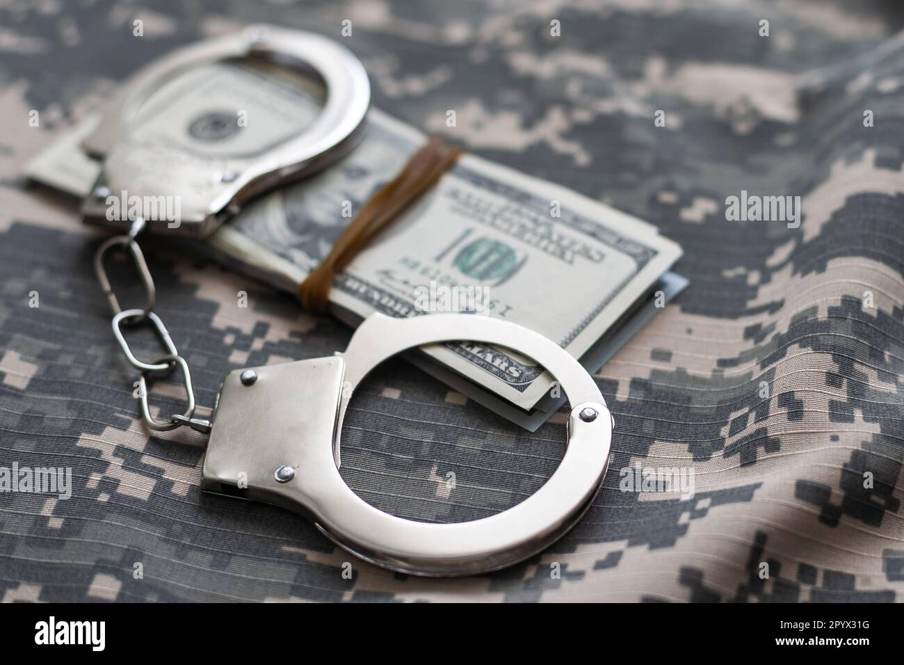 military uniform and handcuffs, money Stock Photo - Alamy