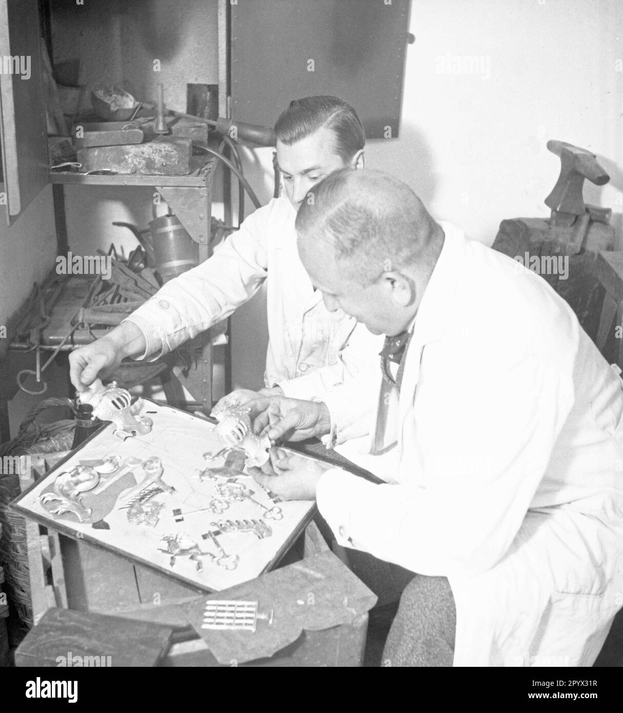 Two craftsmen hi-res stock photography and images - Alamy