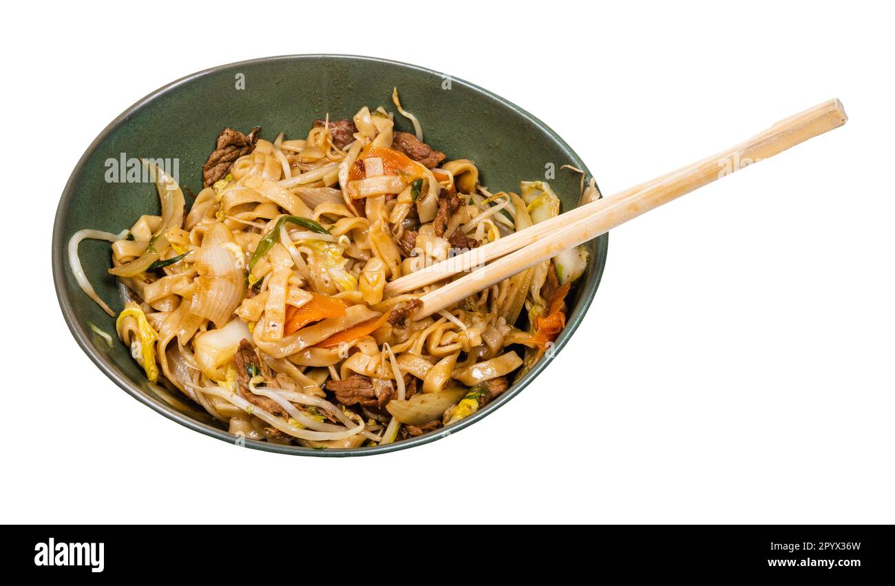 vietnamese Sao Udon fried in wok with vegetables and beef pieces in ...