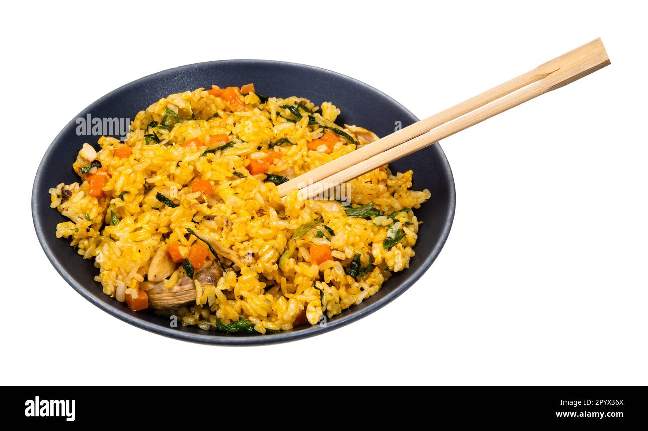 Vietnamese Fried Rice with vegetables and chicken in bowl with ...