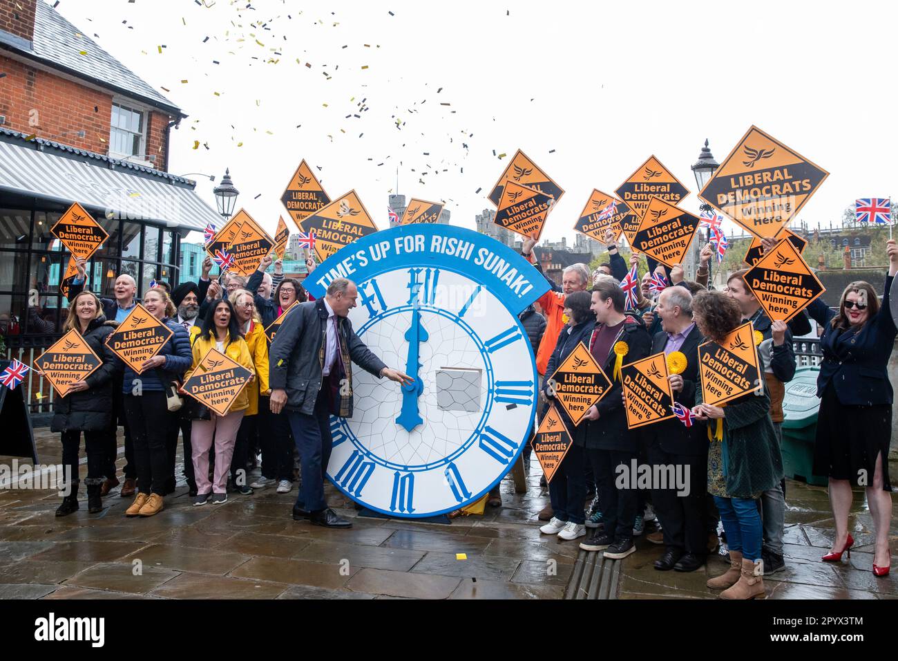 Eton, UK. 5th May, 2023. Liberal Democrat leader Ed Davey showers newly ...