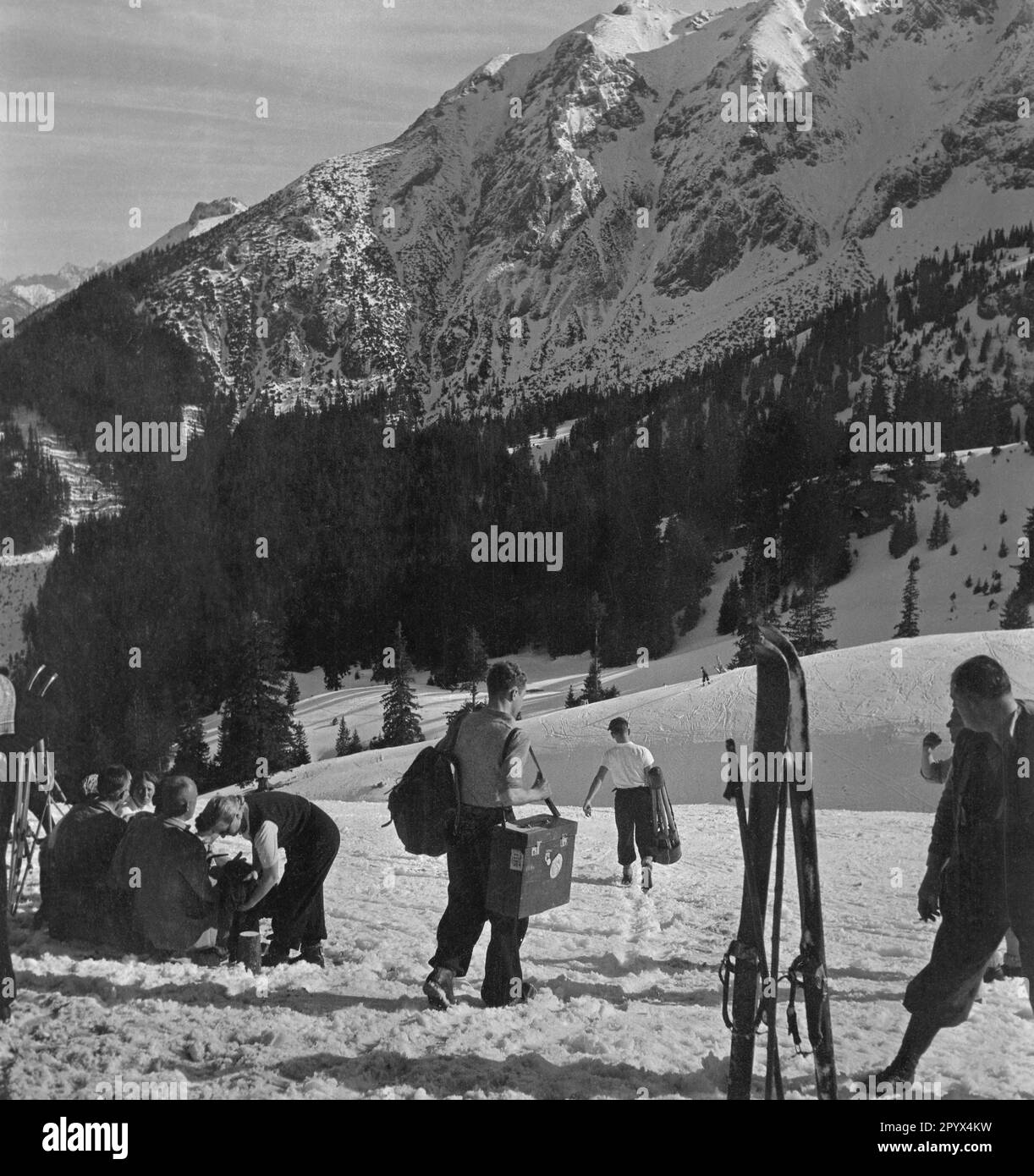 "People taking a break on a high alpine pasture at a recreation home of ...