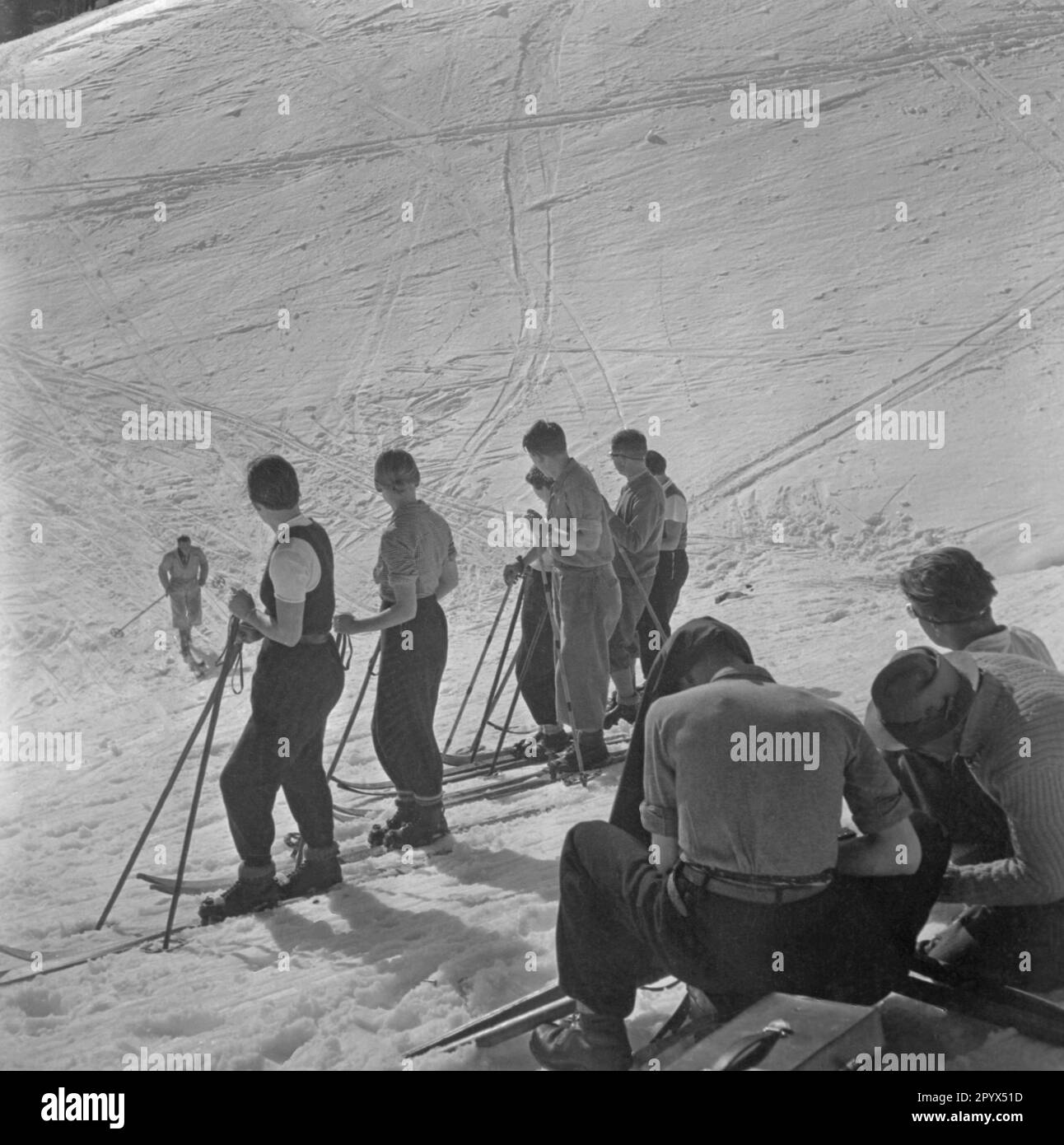 "View of a group of skiers on a high alpine pasture at a recreation ...
