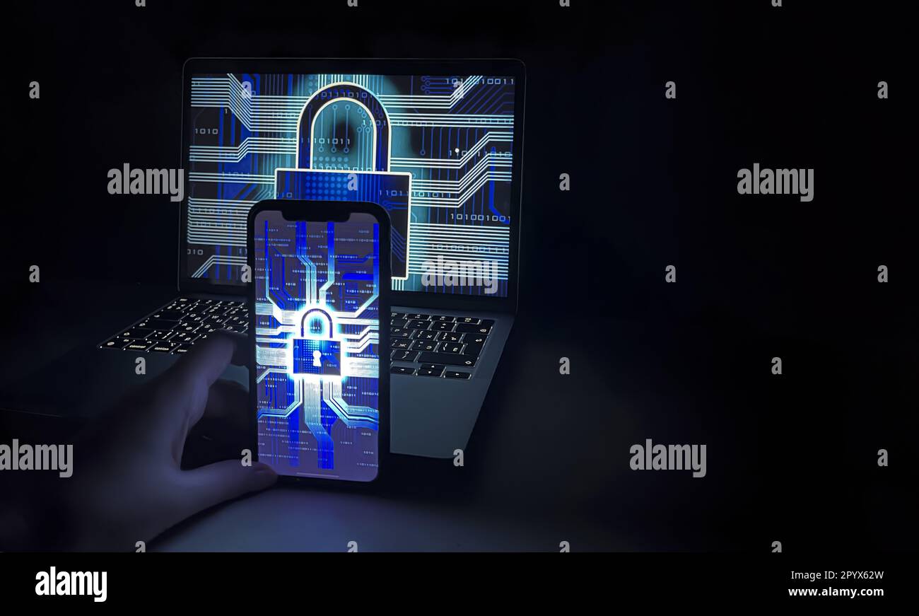 Locked laptop and smartphone screen. Cyber security concept. Hacking ...