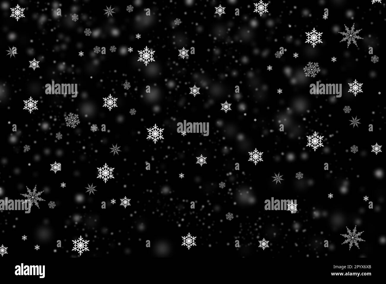 Falling snow flakes isolated on black background Stock Photo - Alamy