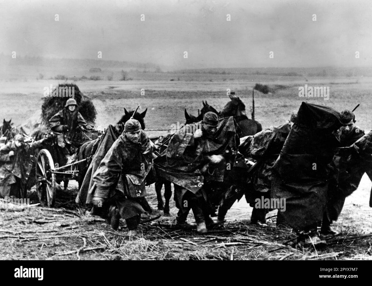 Soldiers pulling a horse-drawn cart during the advance after the double ...