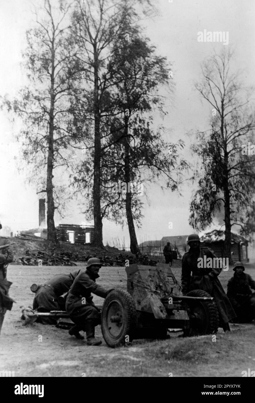 German soldiers with a 3.7cm Pak 36 on a road near Dorogobisch. Photo ...