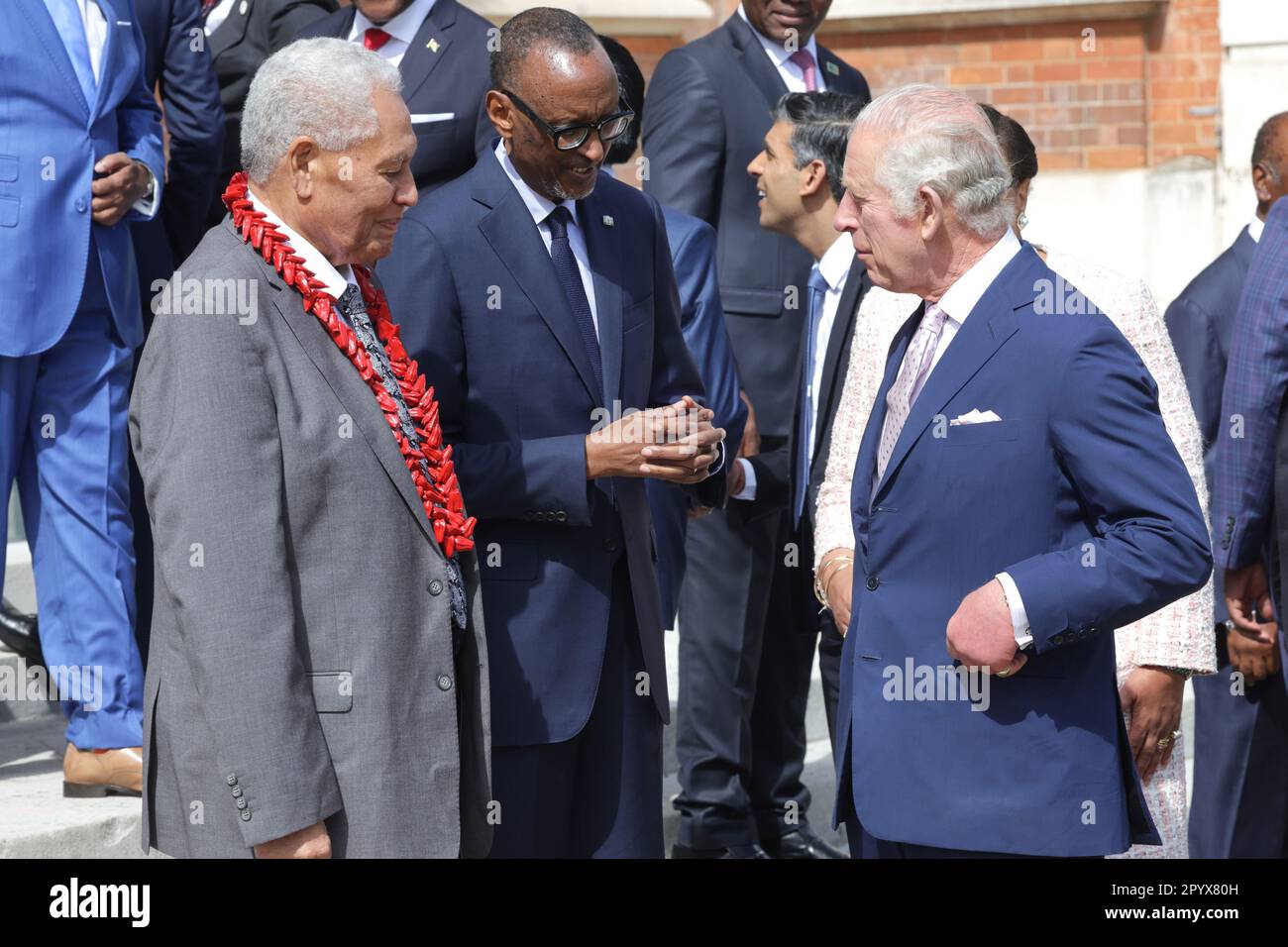 President of Rwanda, Paul Kagame (second left), and King Charles III ...