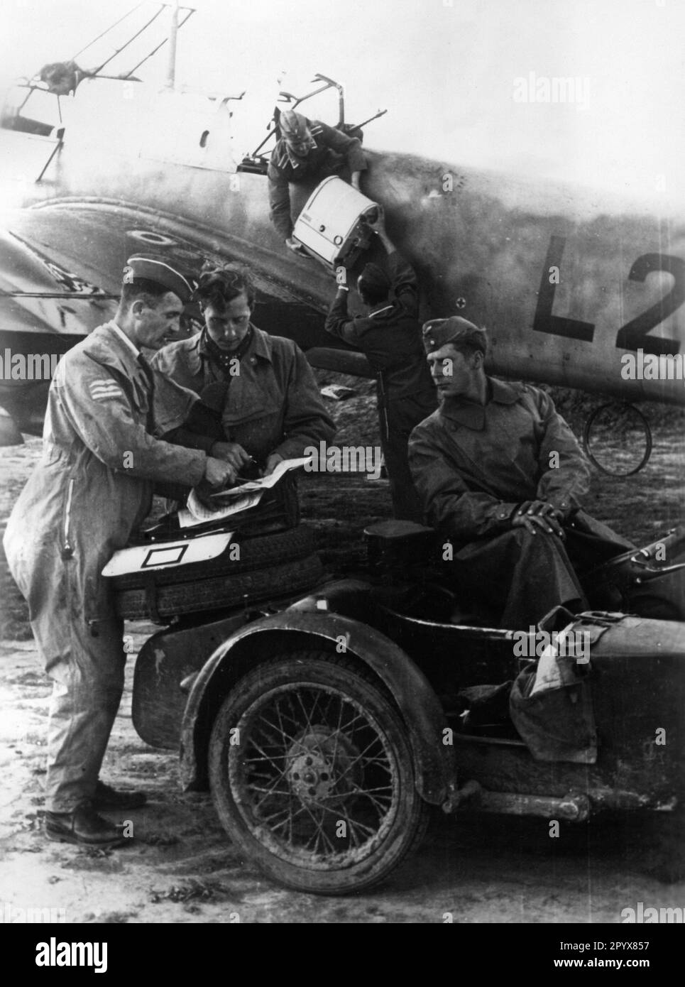 After the landing of a Messerschmidt Me 110 reconnaissance aircraft, a ...
