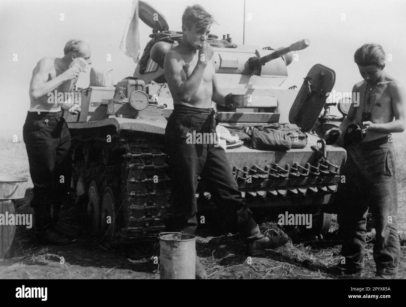 Tank soldiers at morning wash in the southern section of the Eastern ...